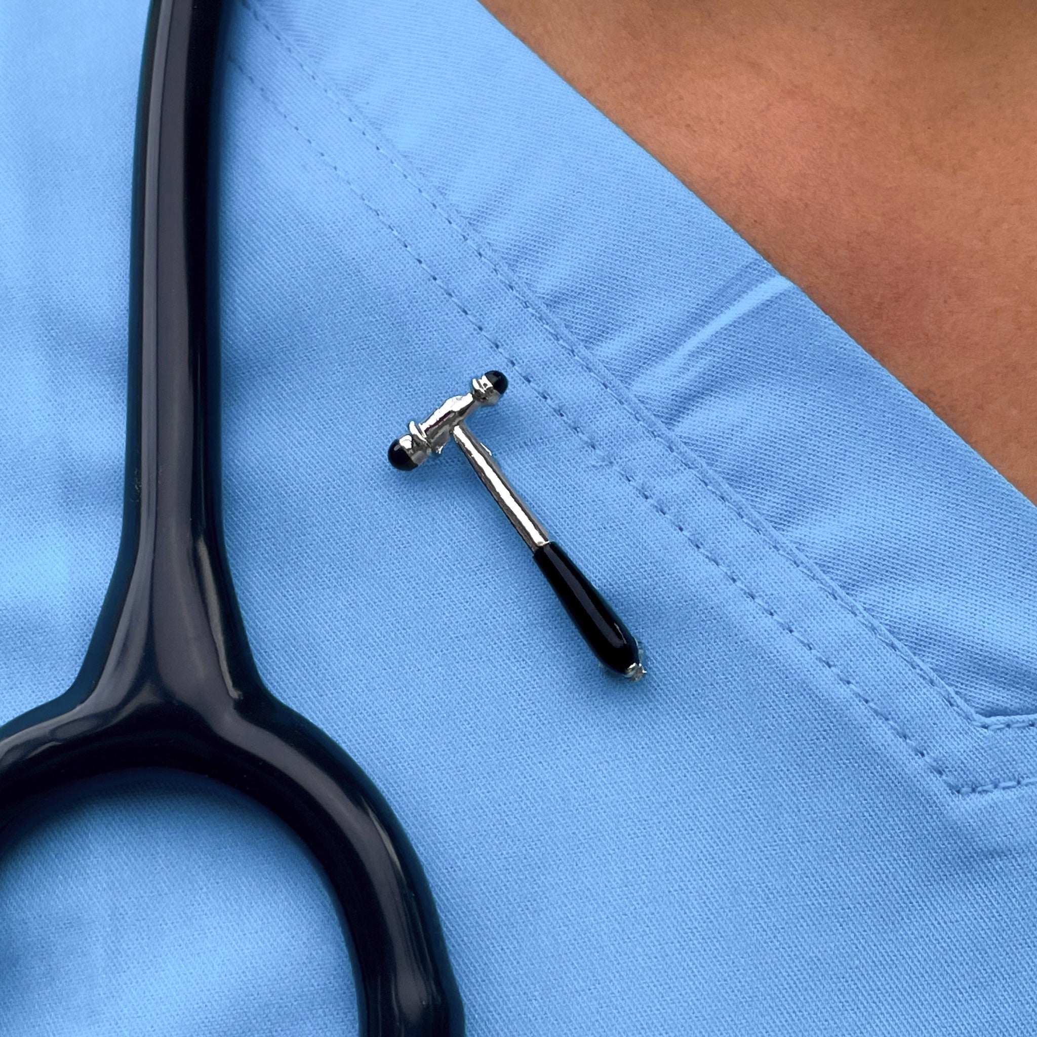 Reflex Hammer Pin – Frontline Boutique